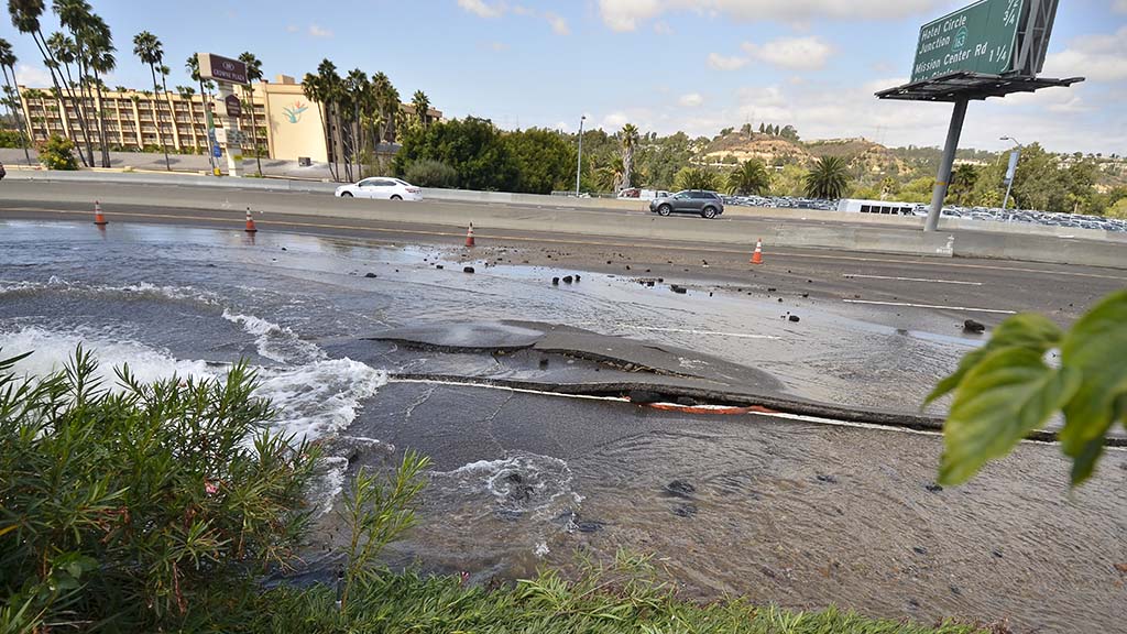 Flooding closes roads, prompts travel warnings across SD County