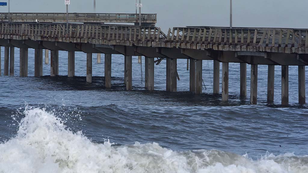 Surfing King Tide Near Scarred Ocean Beach Pier - Times of San Diego