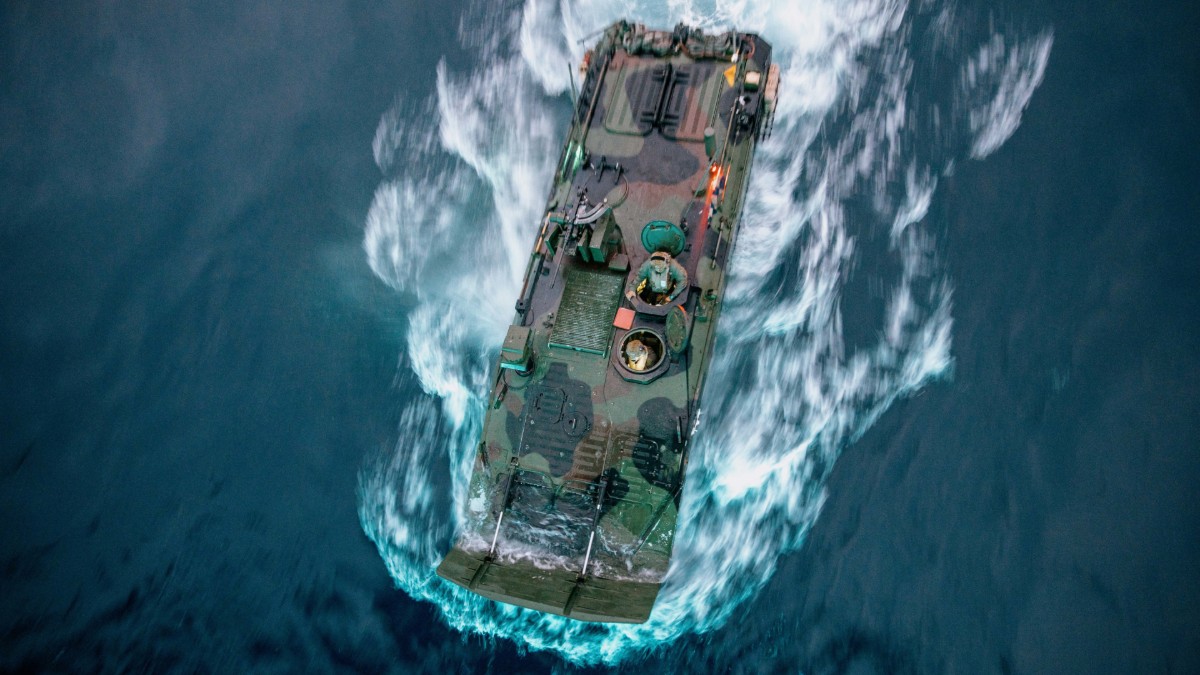 Aerial Photo: Marine amphibious combat vehicle maneuvering in the Pacific